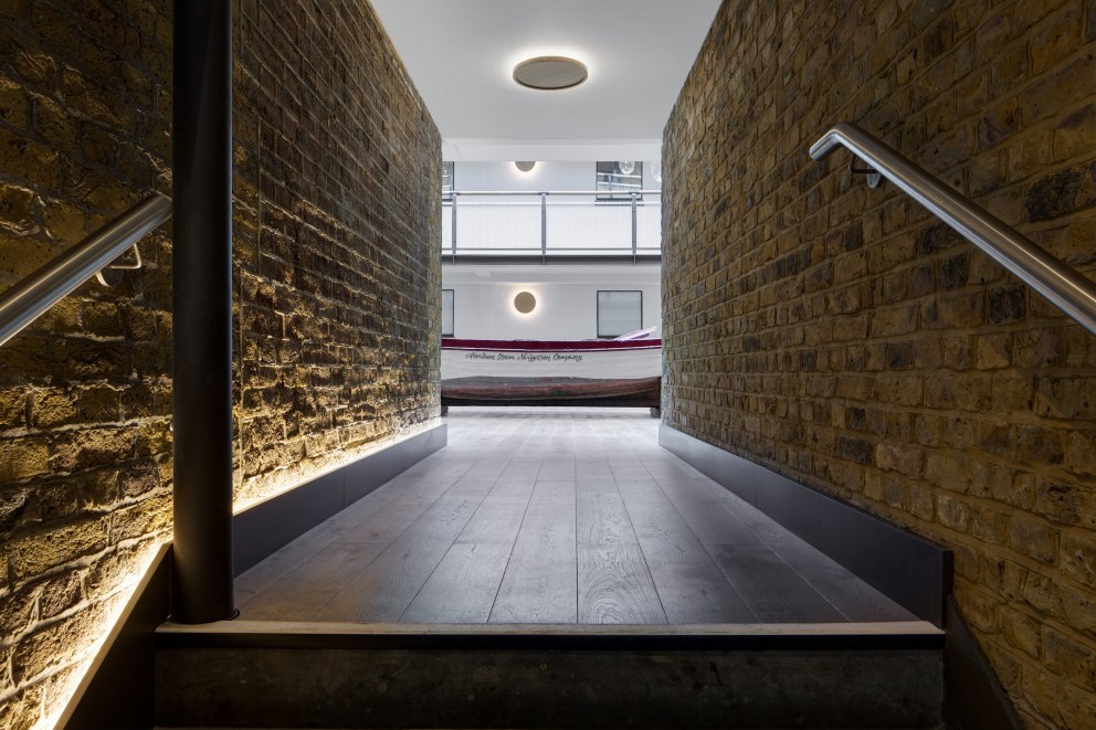 View from the main entrance staircase into the atrium / Residential ...