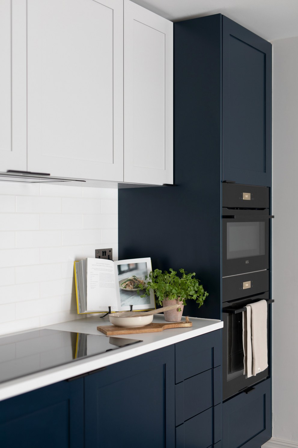 Navy kitchen, made bespoke with tile splashback and corian worktop ...